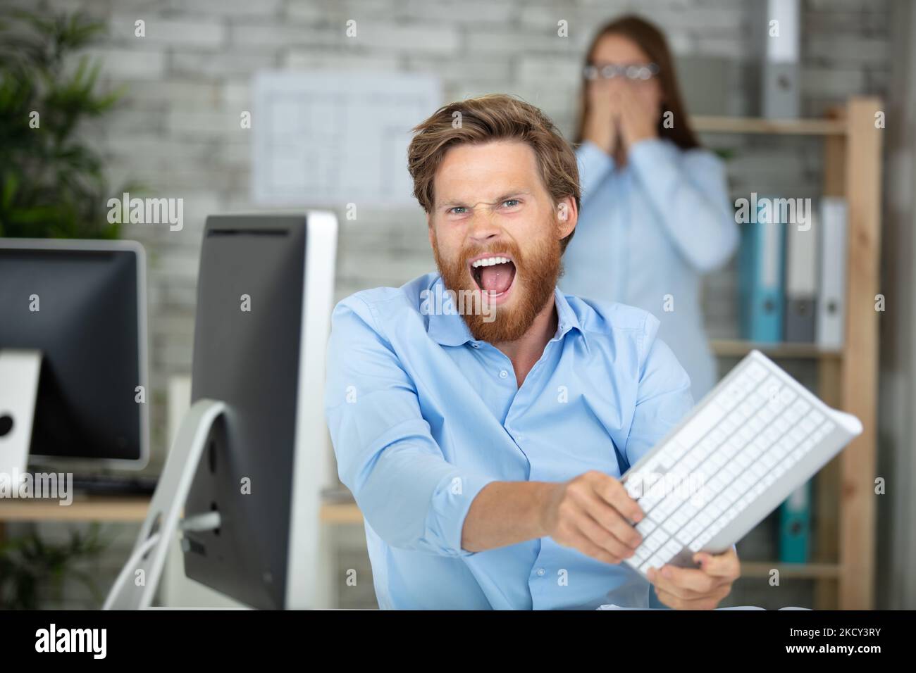 angry man wants to break pc Stock Photo - Alamy