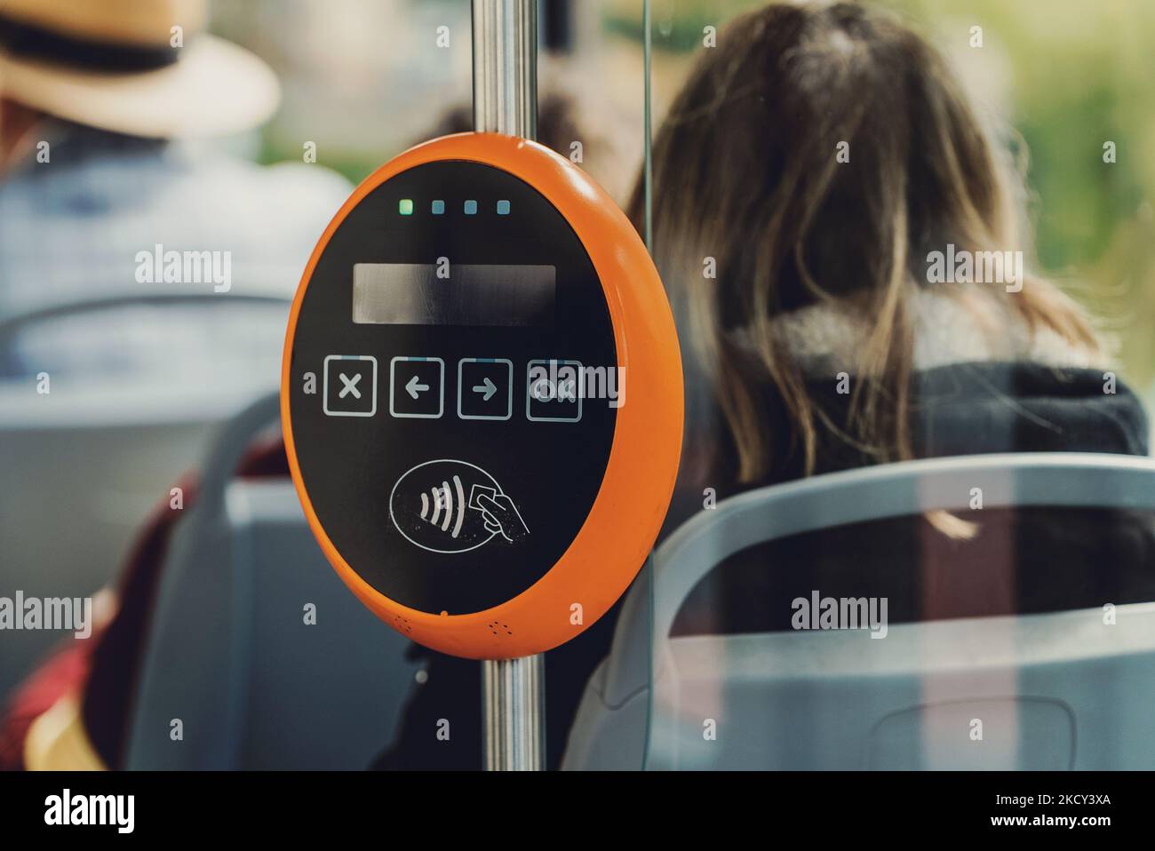 Ticket validation system on modern public transport Stock Photo - Alamy