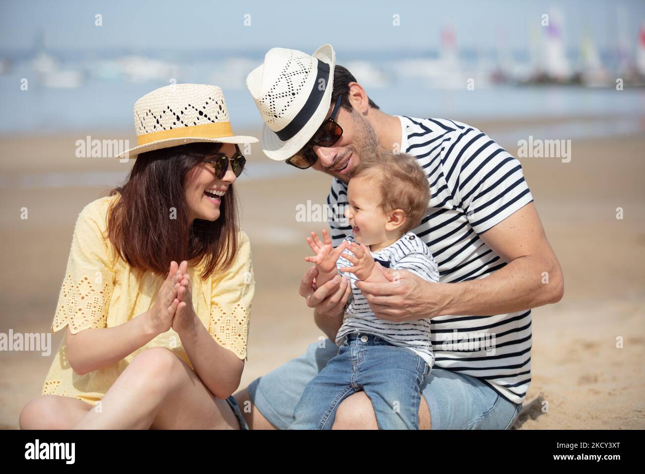 happy family at the beach Stock Photo - Alamy