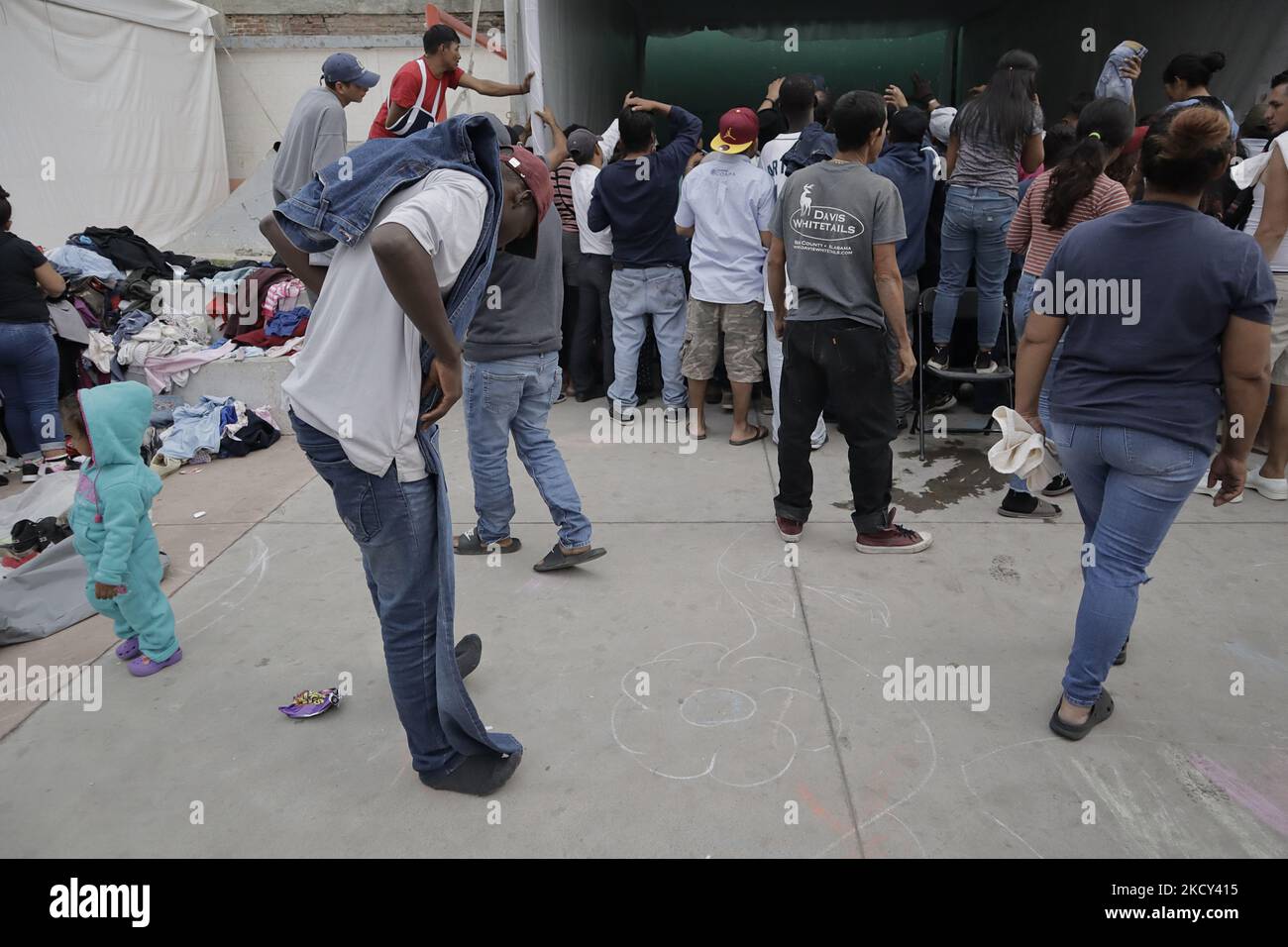 Members of the migrant caravan in the Casa Peregrino located in Mexico ...