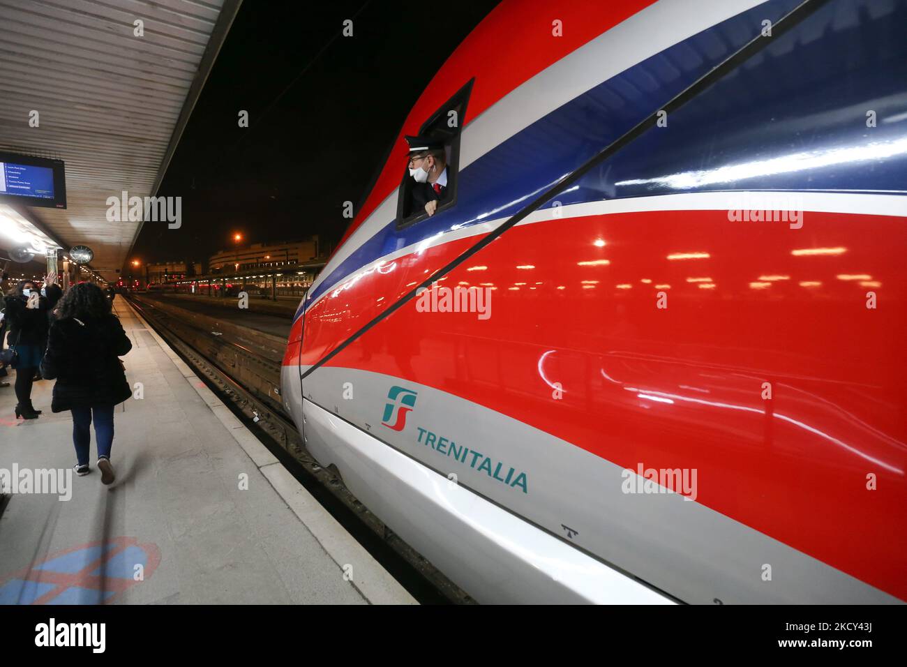 A high-speed train driver stands in the first Frecciarossa, a high-speed train of the Italian ...