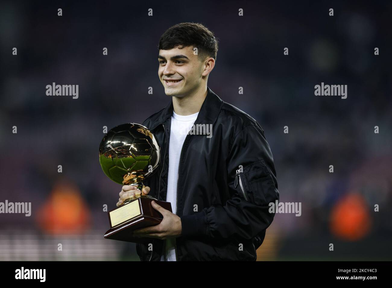 16 Pedri Gonzalez of FC Barcelona celebrates his Golden Boy Trophy 2021 ...