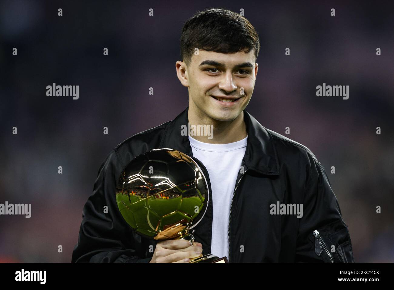 16 Pedri Gonzalez of FC Barcelona celebrates his Golden Boy Trophy 2021 ...