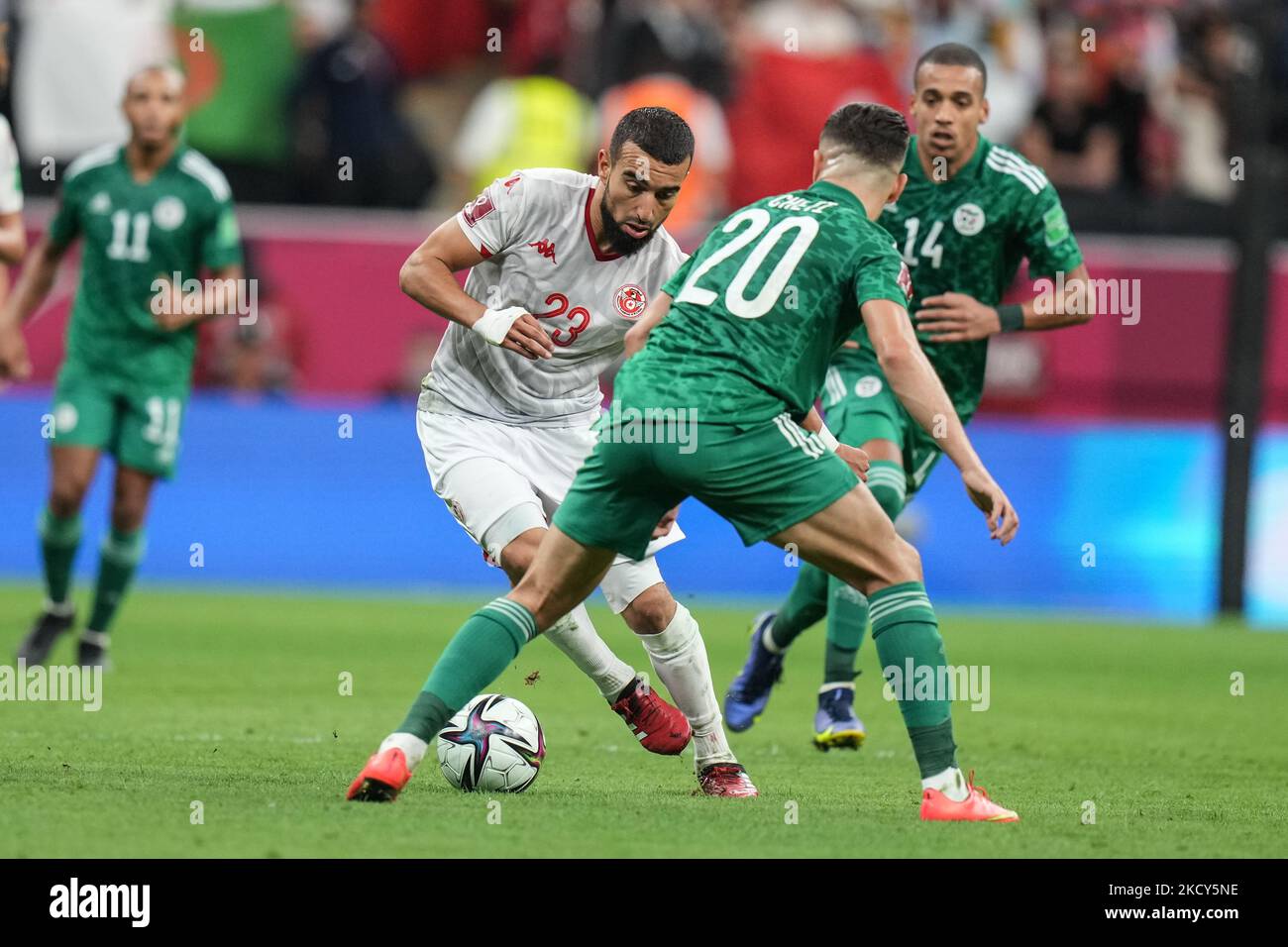 (23) SLITI Naim of Tunisia team battles for possession with (20) CHETI ...