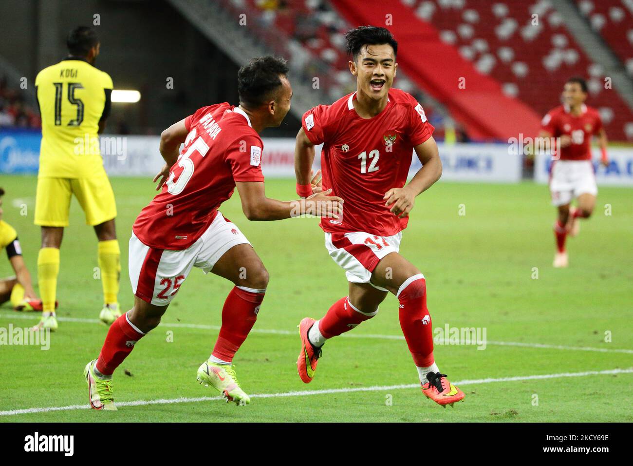 Pratama Arhan Alif Rifai of Indonesia (R) celebrates with Irfan ...