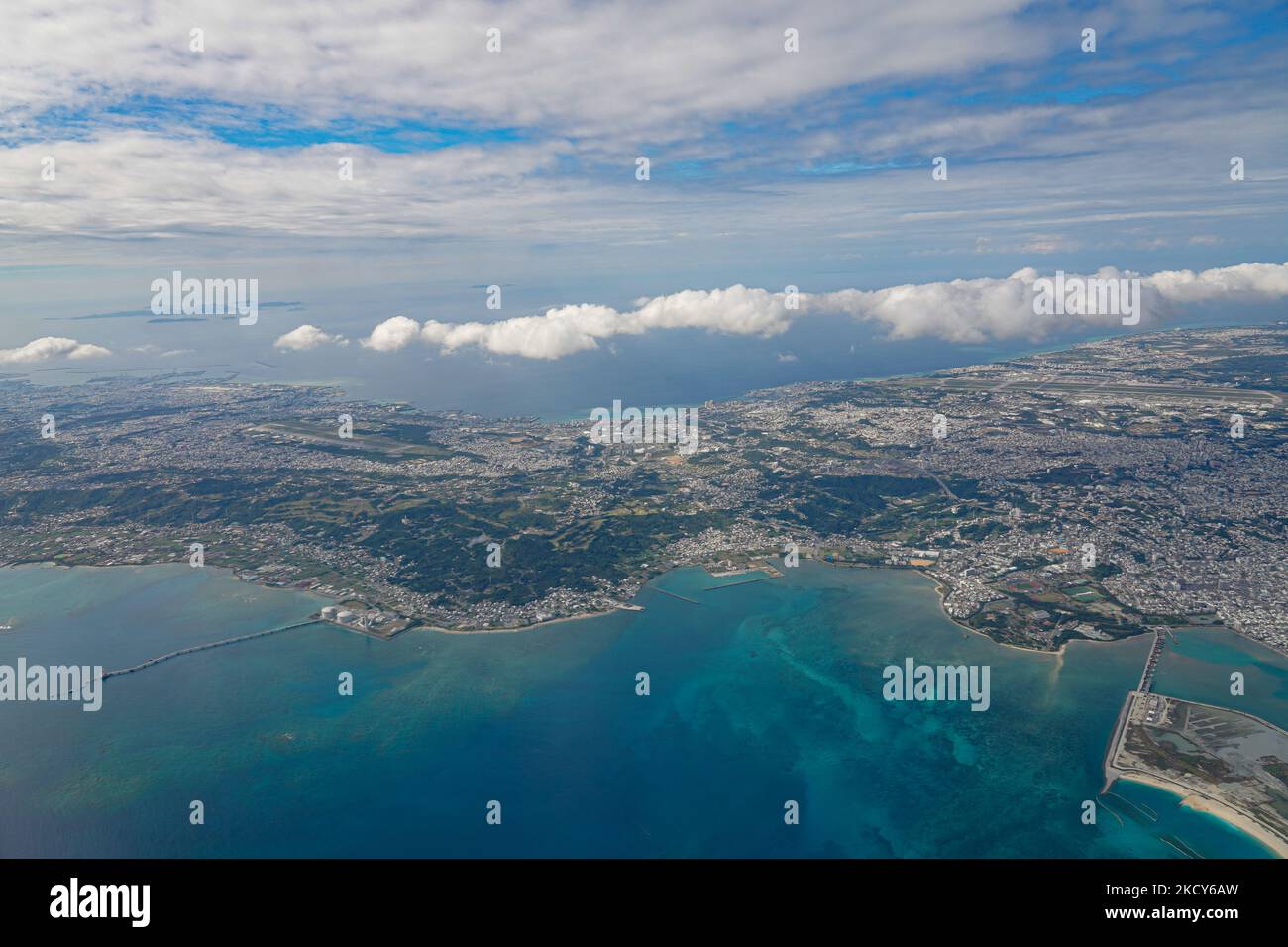In an aerial view of central Okinawa Island, US Air Station Futenma (L ...