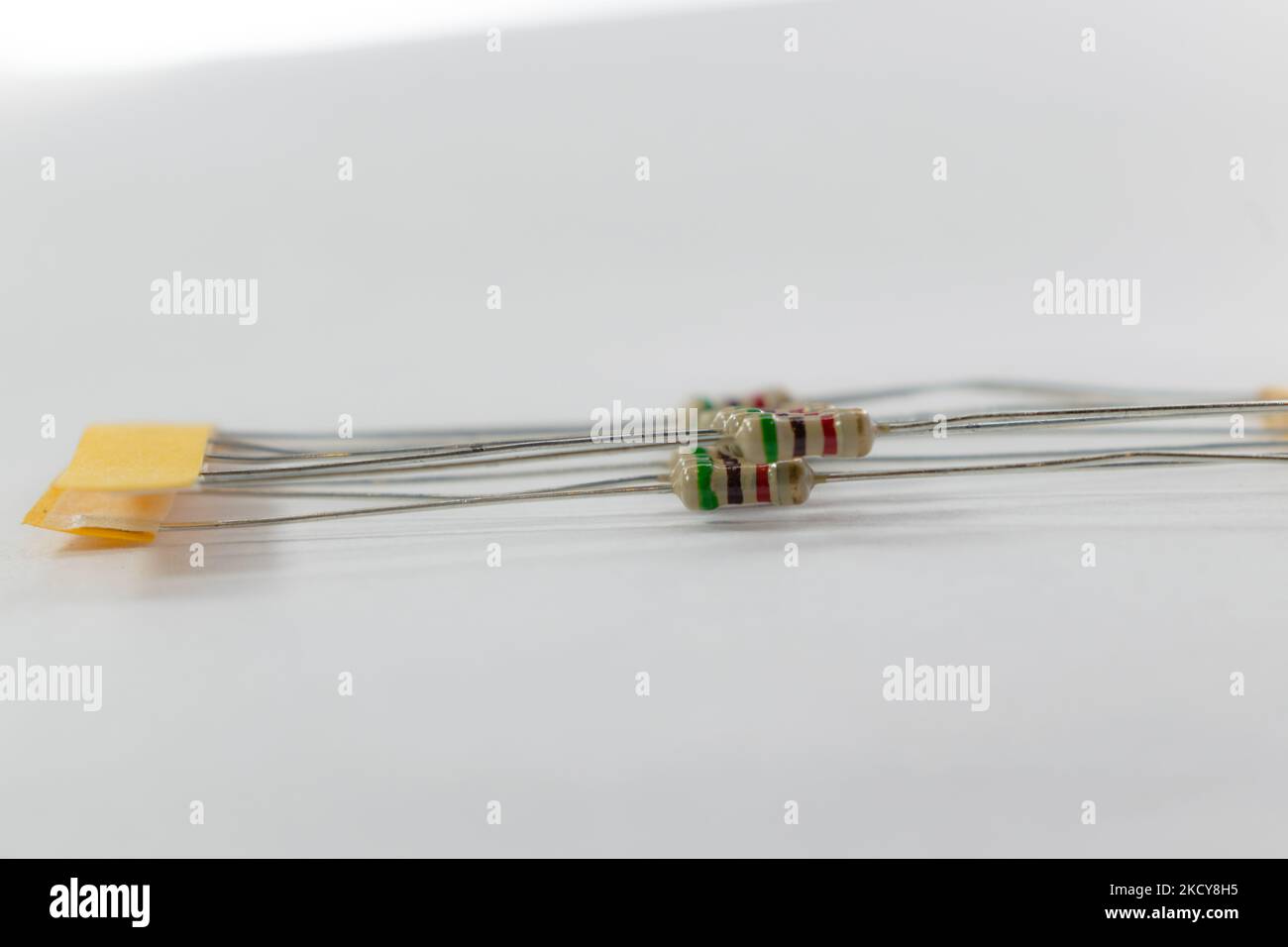 close up shot of resistors isolated on a white background.10kilo ohm ...