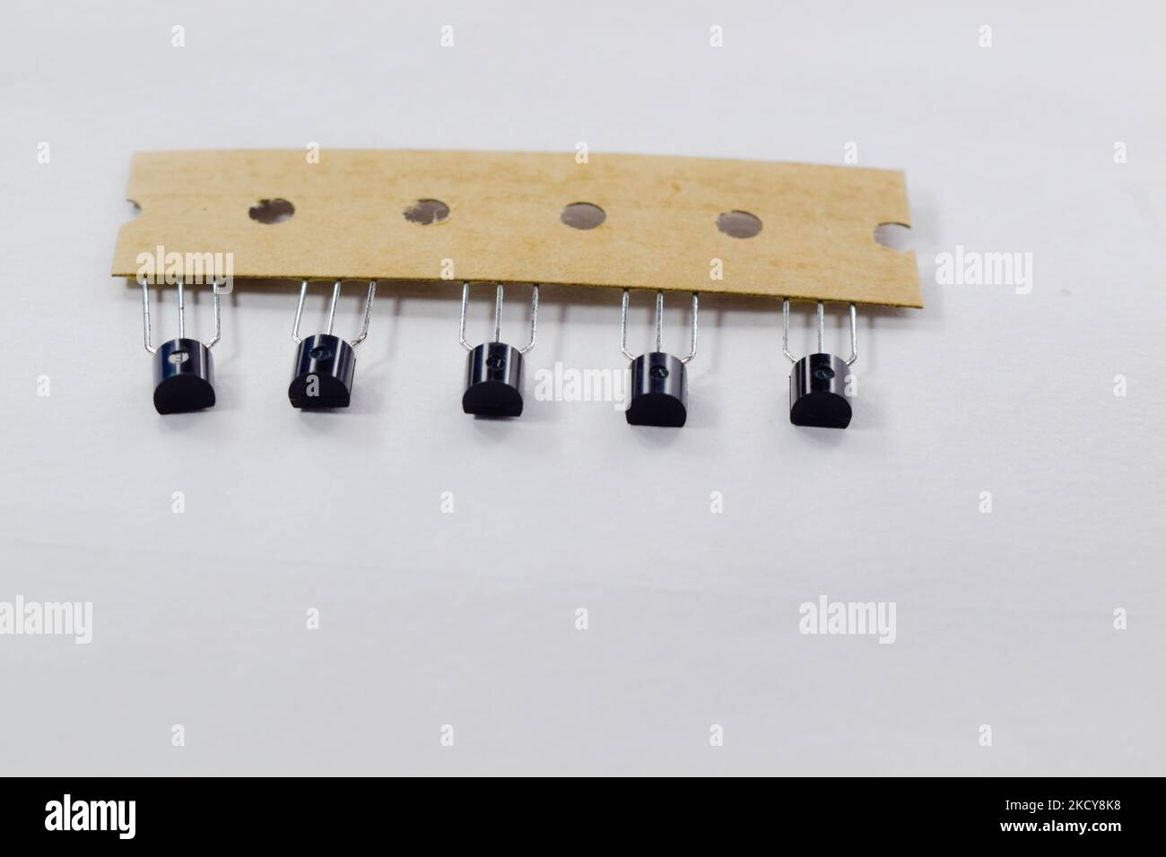Multiple pieces of transistors on a white background. Selective focus ...