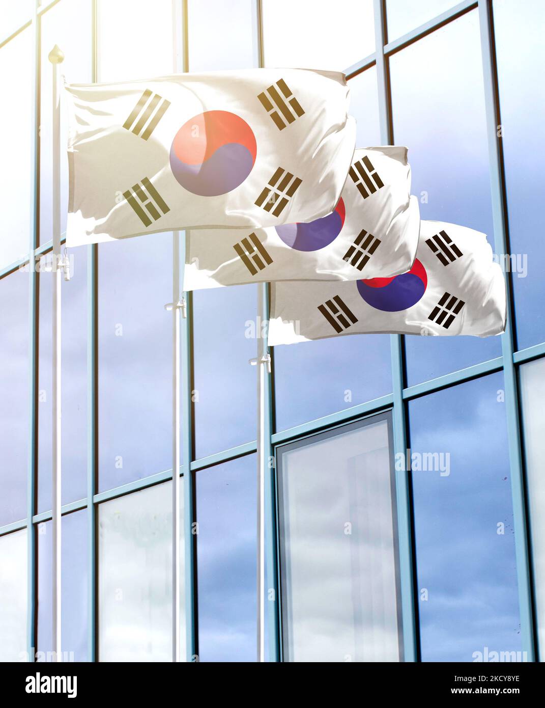 Flagpoles with the flag of South Korea in front of the business center ...