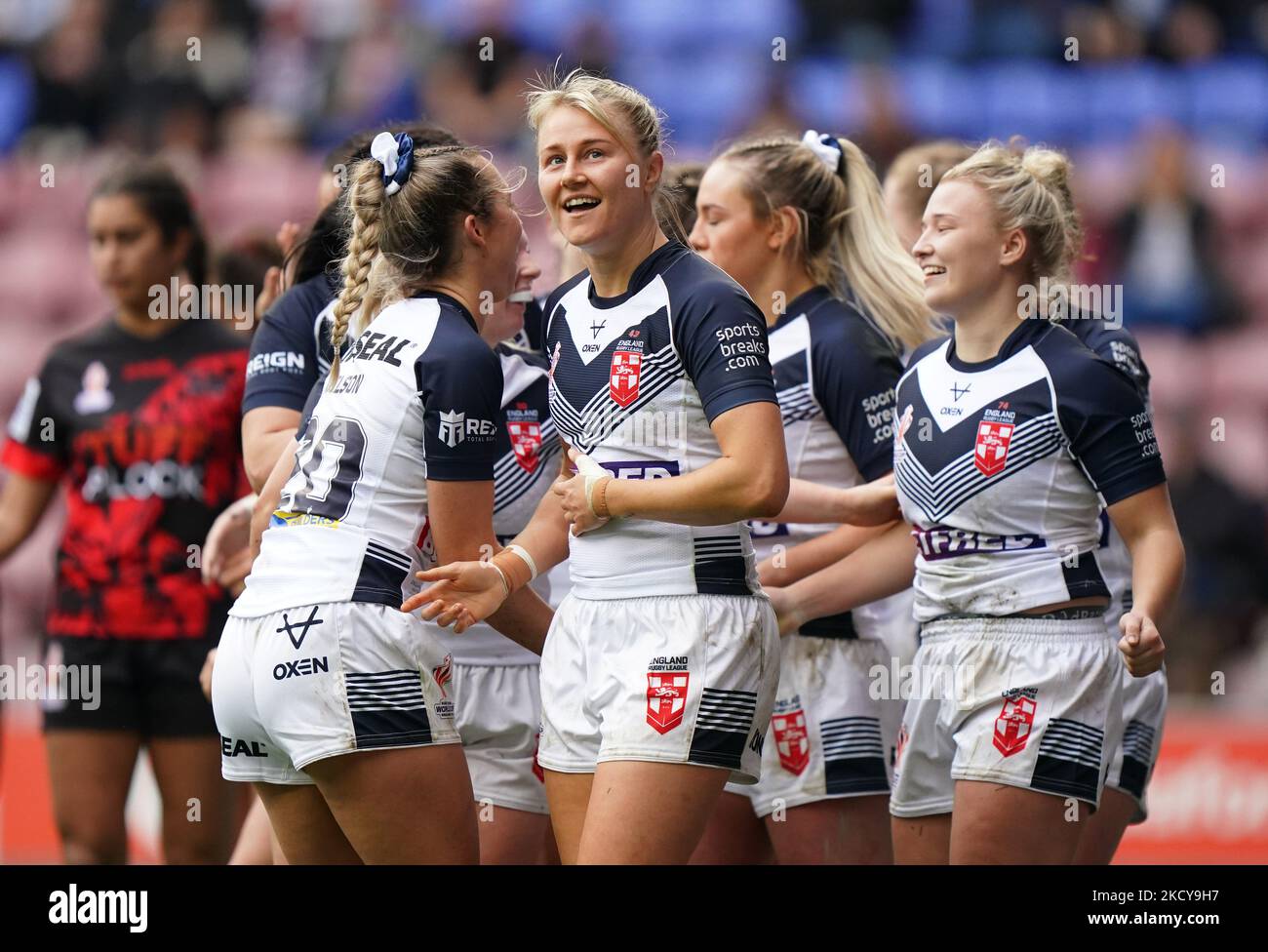 England's Tara-Jane Stanley (centre) celebrates after team-mate Georgia ...