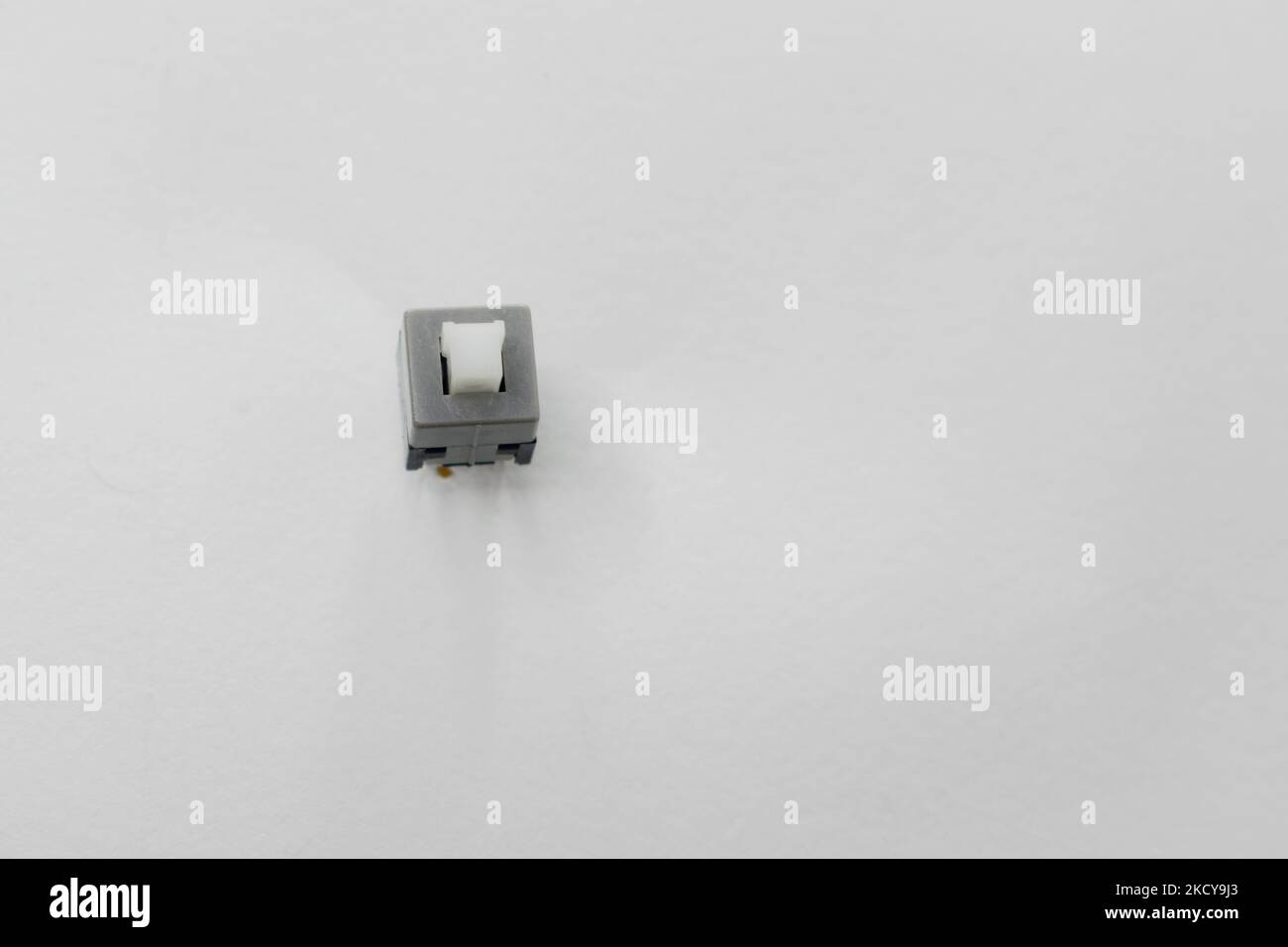 Electronic single push button isolated against white background ...