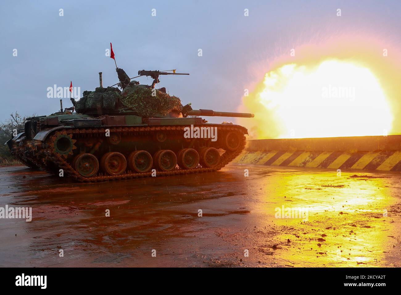 A M60-A3 tank fires cannons during a live ammunition military drill at ...