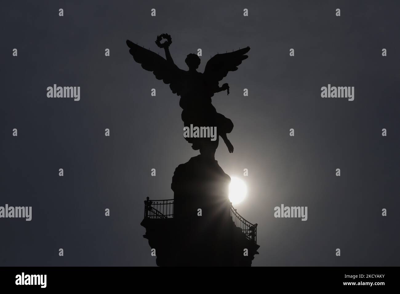 A backlight view of the Angel of Independence in Mexico City, during ...