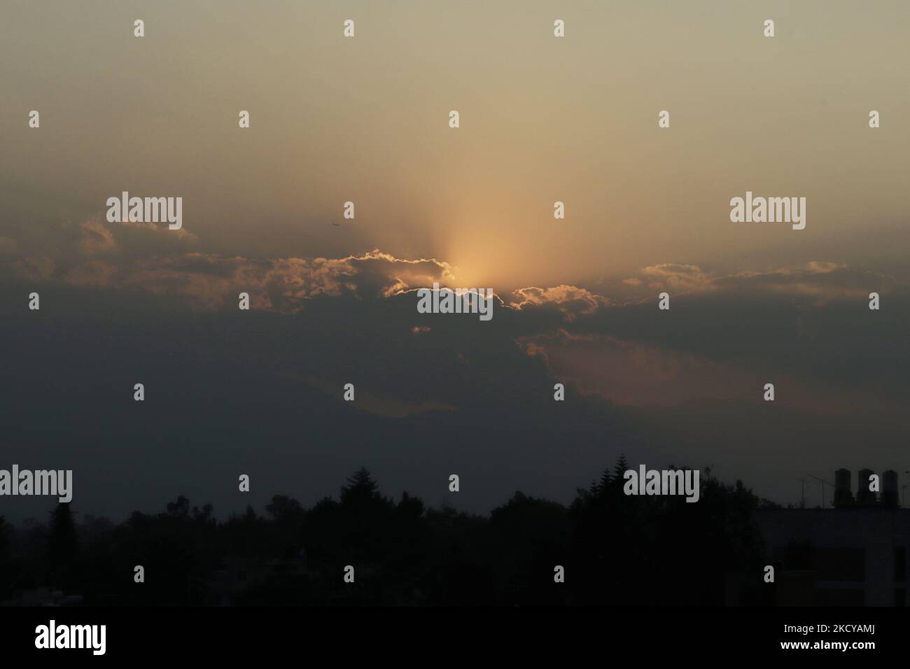 Sunset view in the area of Iztapalapa, Mexico City, during the ...