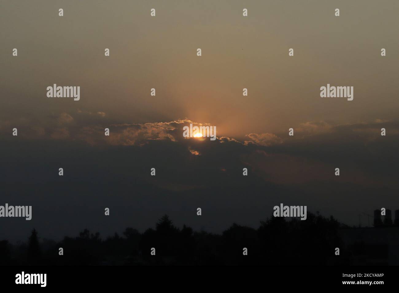 Sunset view in the area of Iztapalapa, Mexico City, during the ...