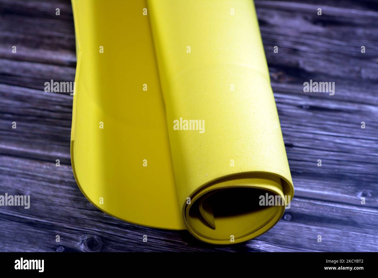 A roll of colorful Eva foam sheets, colored cardboard, rubber pad ...