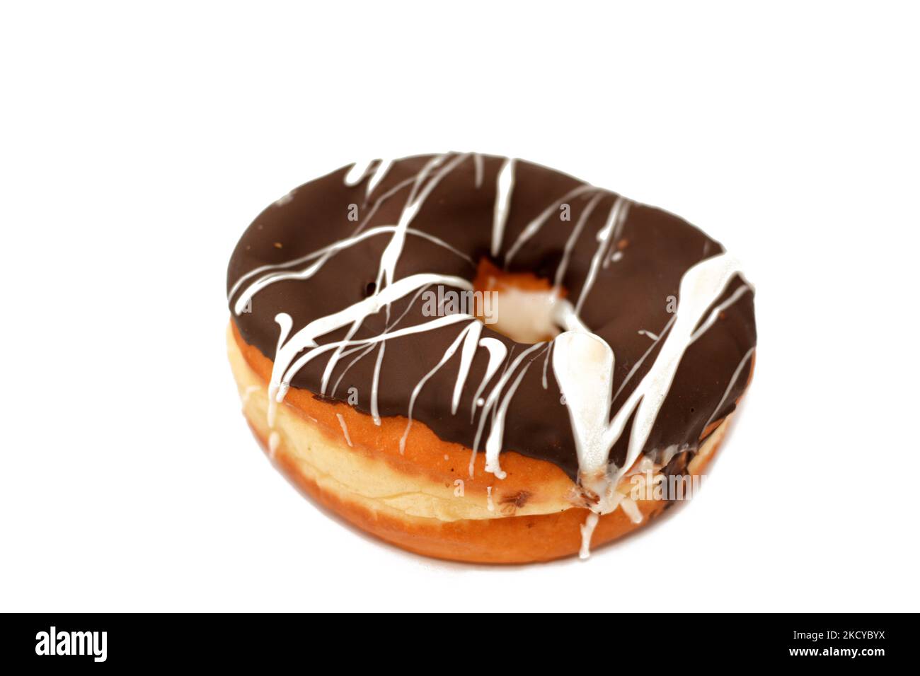 Brown and white chocolate ring donut, A glazed, yeast raised, American ...