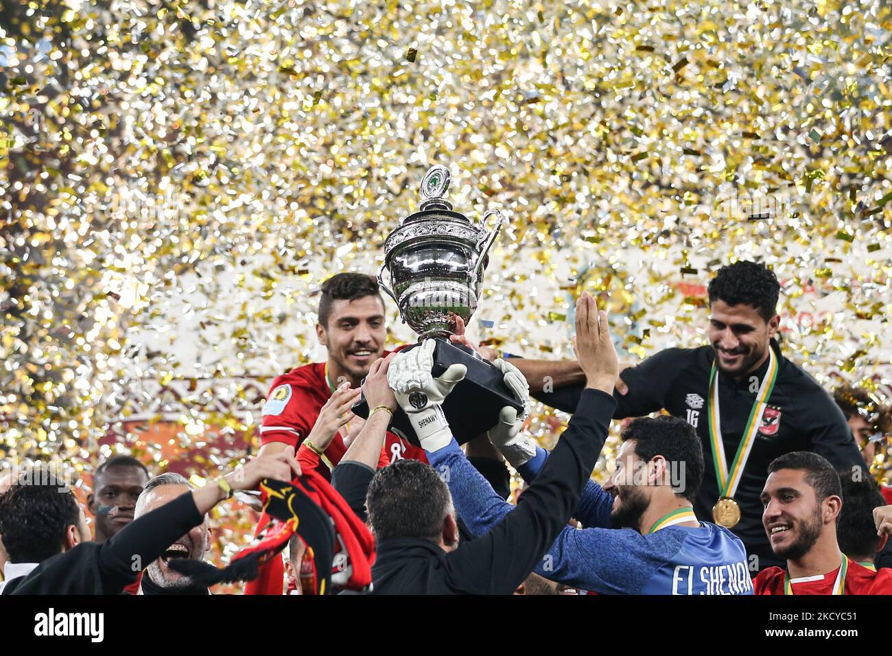 Al Ahly team lifts the Super Cup trophy following victory the CAF Super ...
