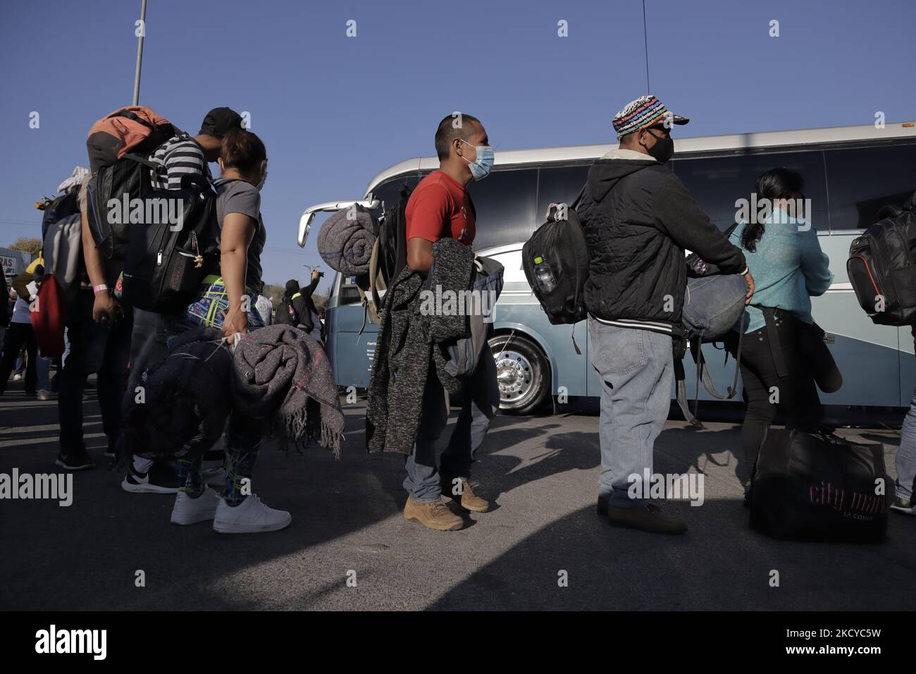 Members of the migrant caravan in the car park of the Casa Peregrino ...