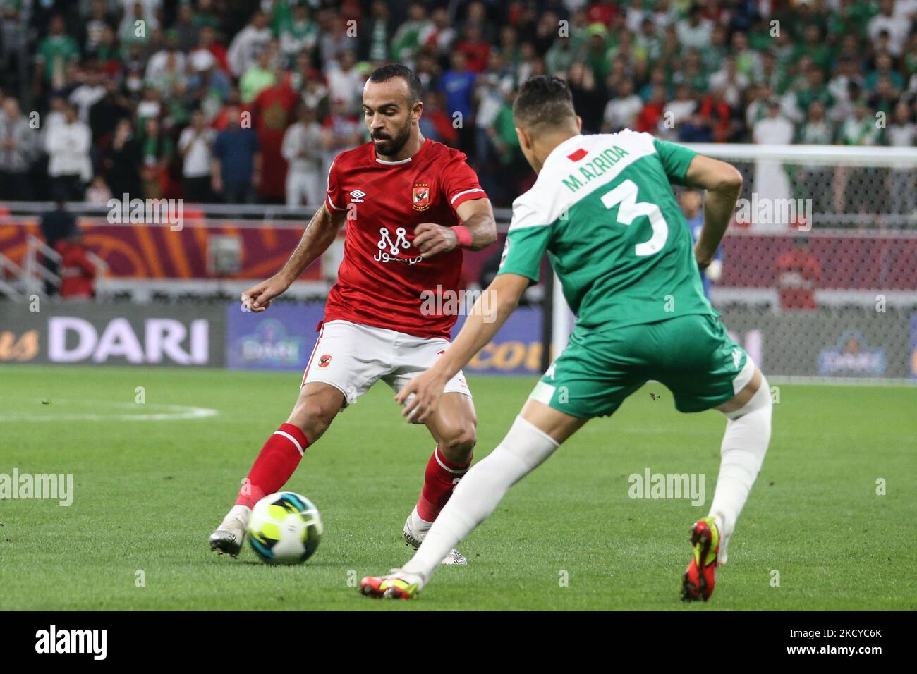 (19) Mohamed Magdi Kafsha of Al Ahly team battles for possession with ...