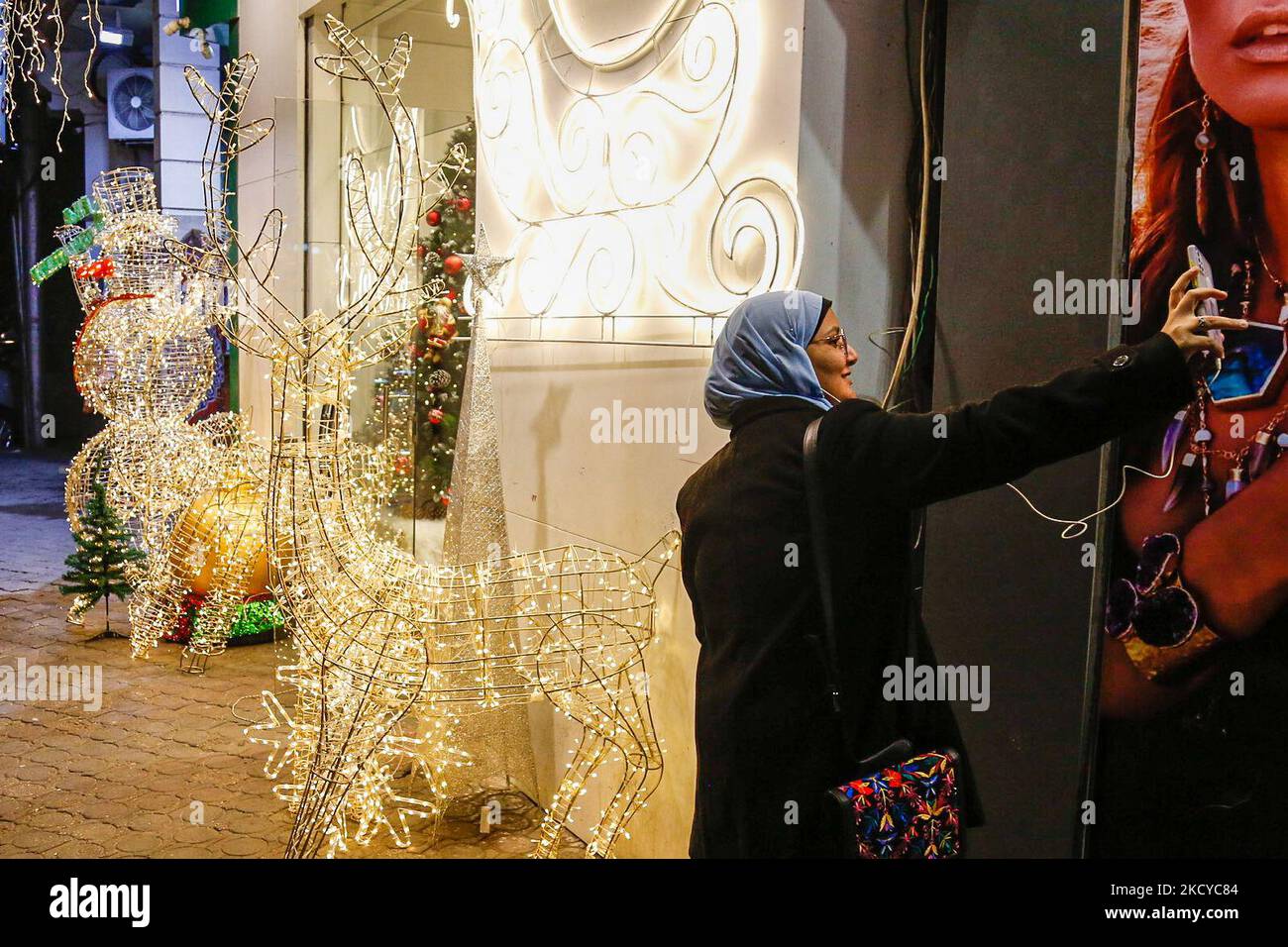 The streets and buildings of the Heliopolis district are decorated with ...