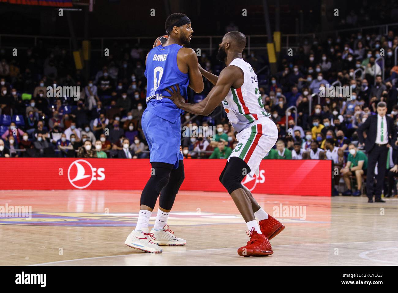0 Brandon Davies of FC Barcelona defended by 23 Tonye Jekiri of UNICS ...