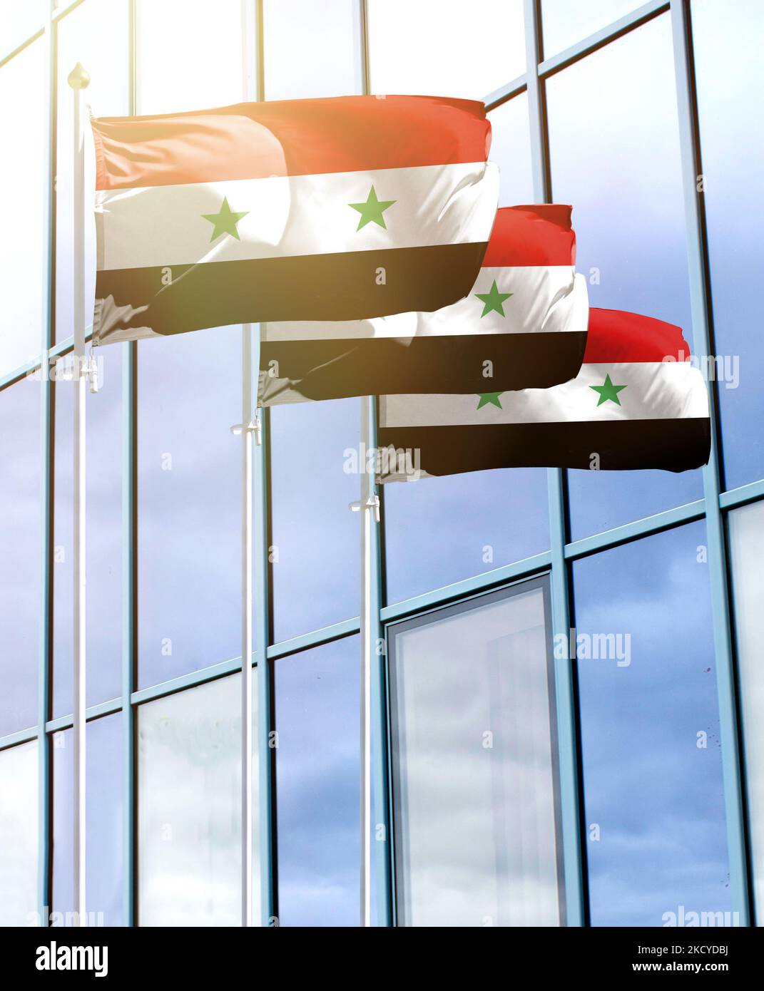 Flagpoles with the flag of Syria in front of the business center Stock ...