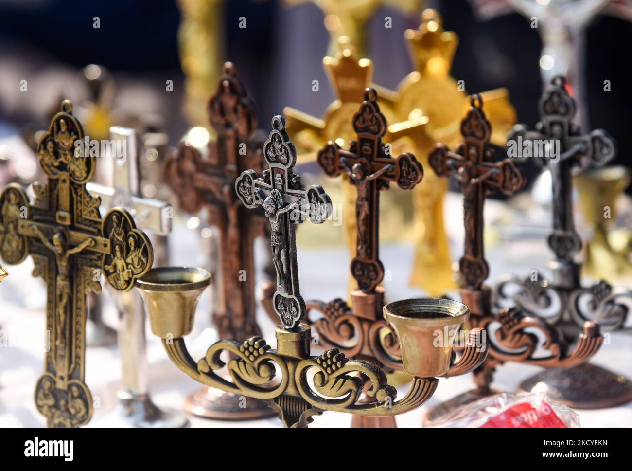 Vendor selling Christian religious items outside a Church on Christmas ...