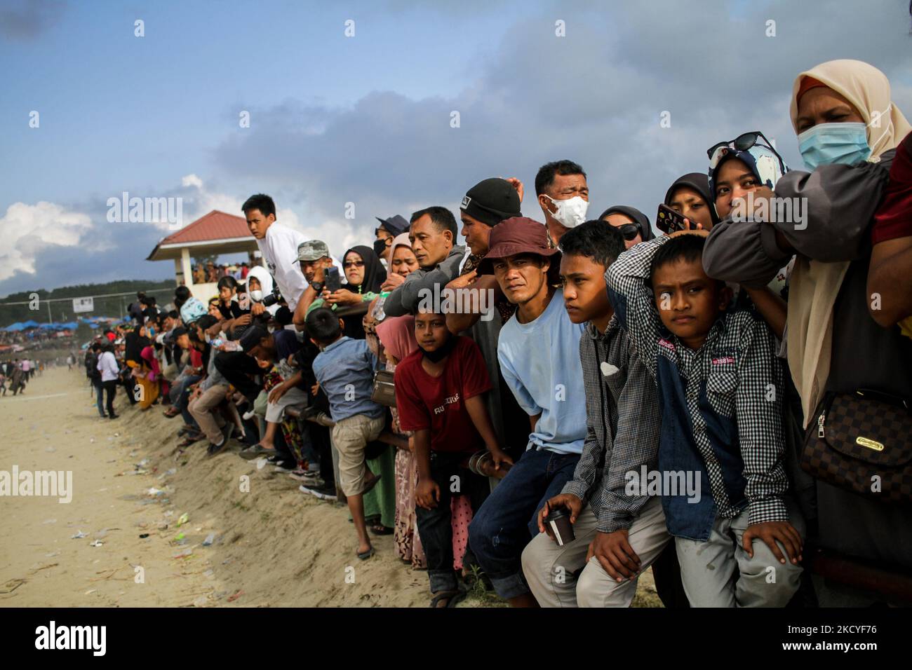 People gather to watch a traditional horse race at the Sengeda ...