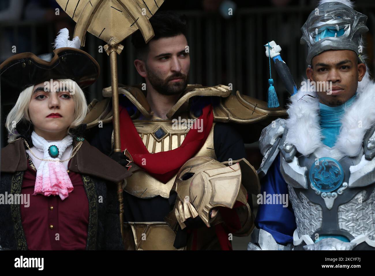 Performers in cartoon costumes pose for photos during the 13th ...