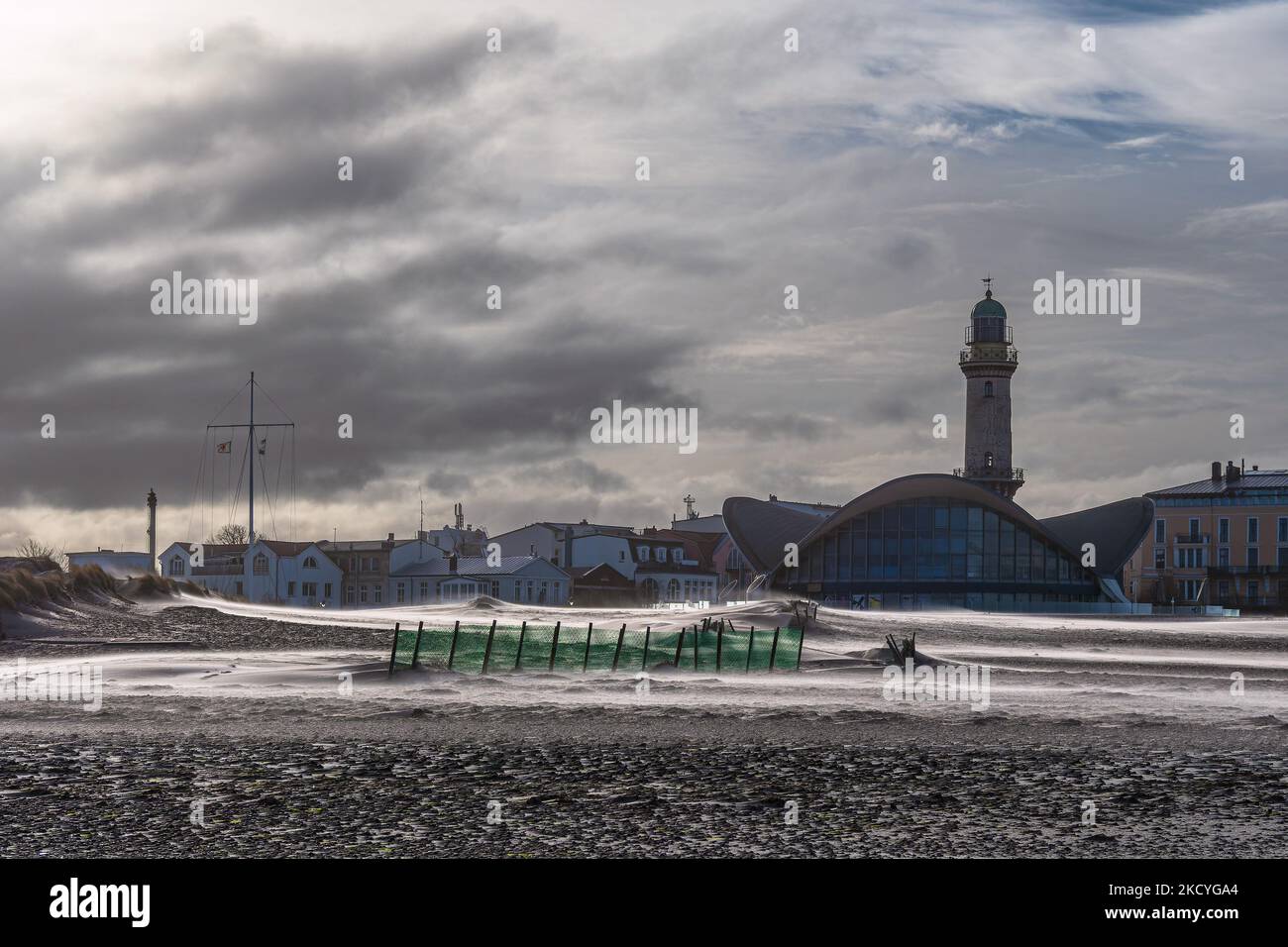 Lighthouse on shore of the Baltic Sea in Warnemuende, Germany Stock ...