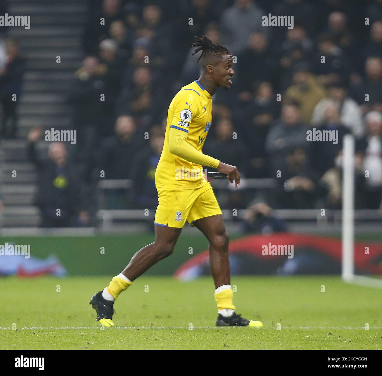 Crystal Palace's Wilfried Zaha takes a long walk after getting a Red ...
