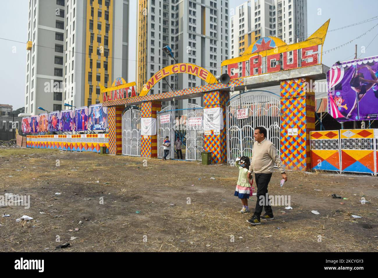 A family is seen buying ticket at a ticket counter of circus in Kolkata ...