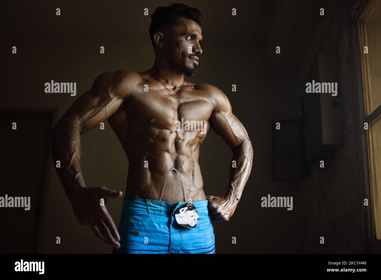 Mukul a bodybuilder poses for a photo at the backstage while preparing ...