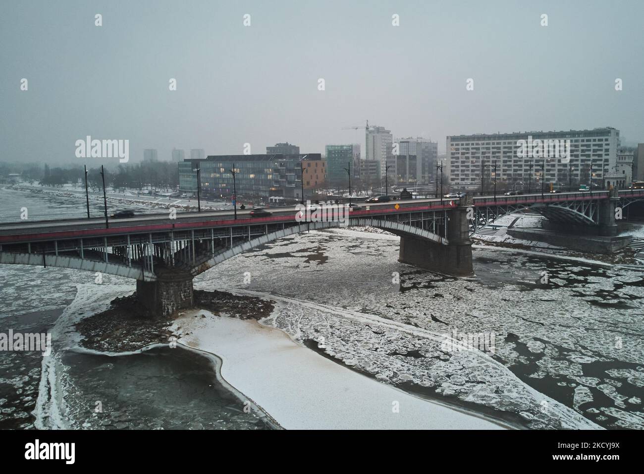 Sheets of ice are seen floating on the Vistula river in Warsaw, Poland ...