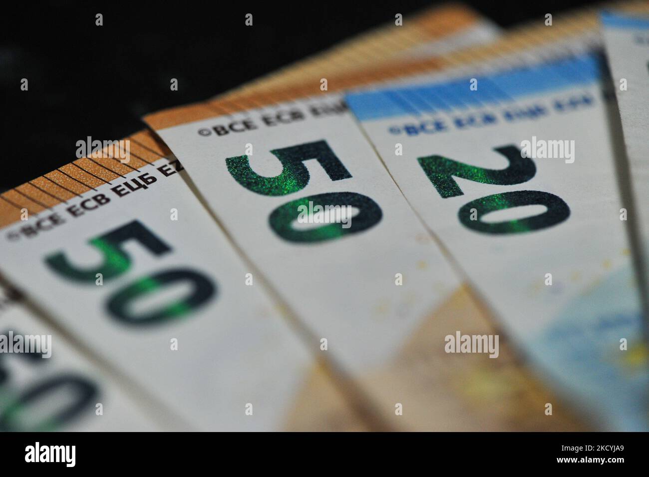 Euro banknotes are seen in L'Aquila, Italy, on december 30, 2021. On ...