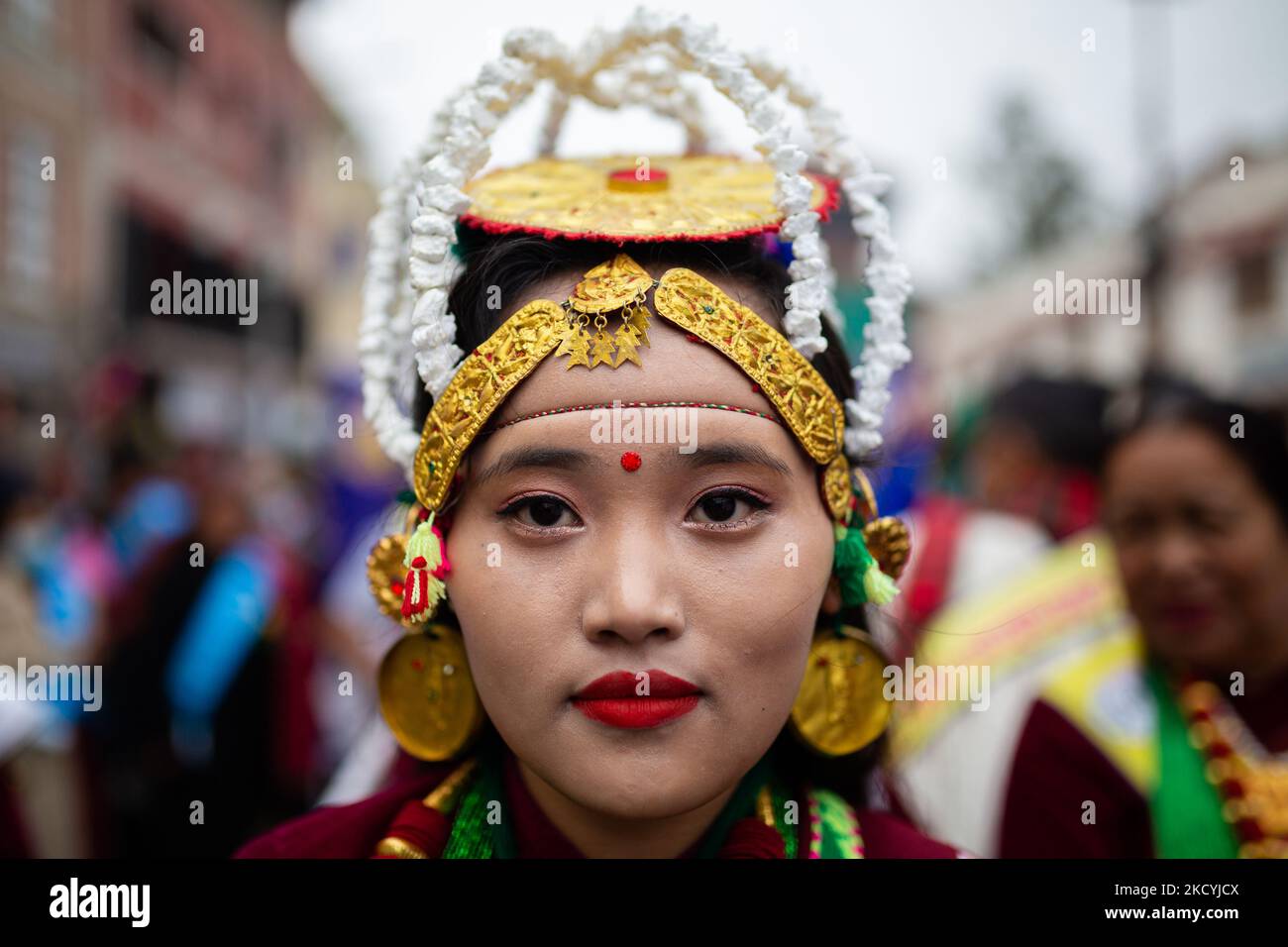 A woman wearing traditional attire take part in the rally on the ...