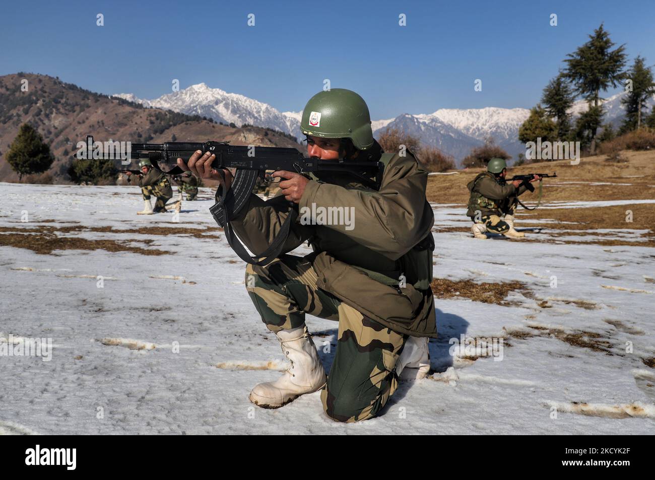 Border Security Force (BSF) soldiers taking position during patrolling ...
