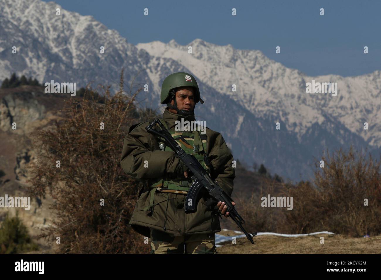 A Border Security Force (BSF) soldier stands alert at a forward post in ...