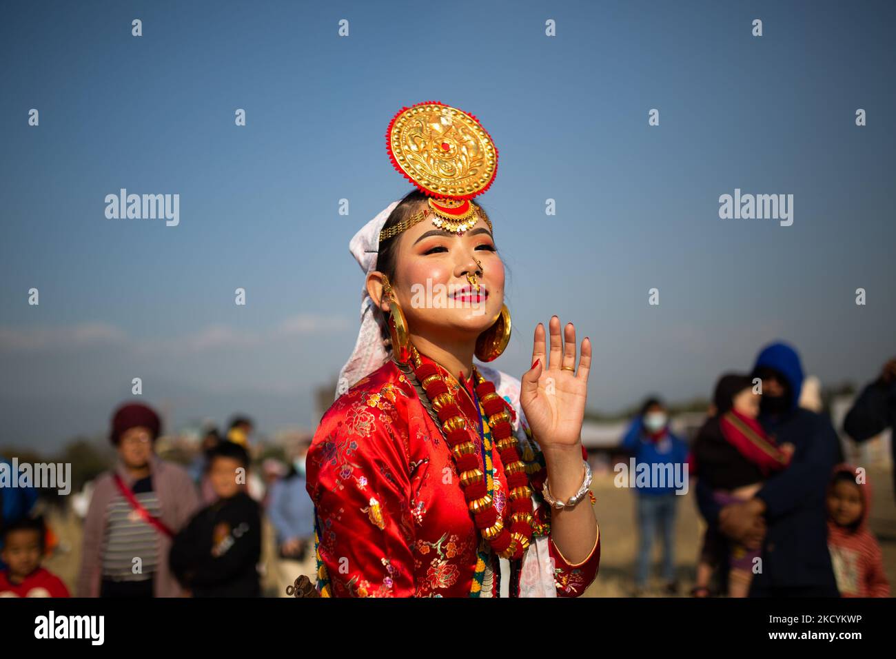A girl from the Kirat community wearing traditional attire dances ...