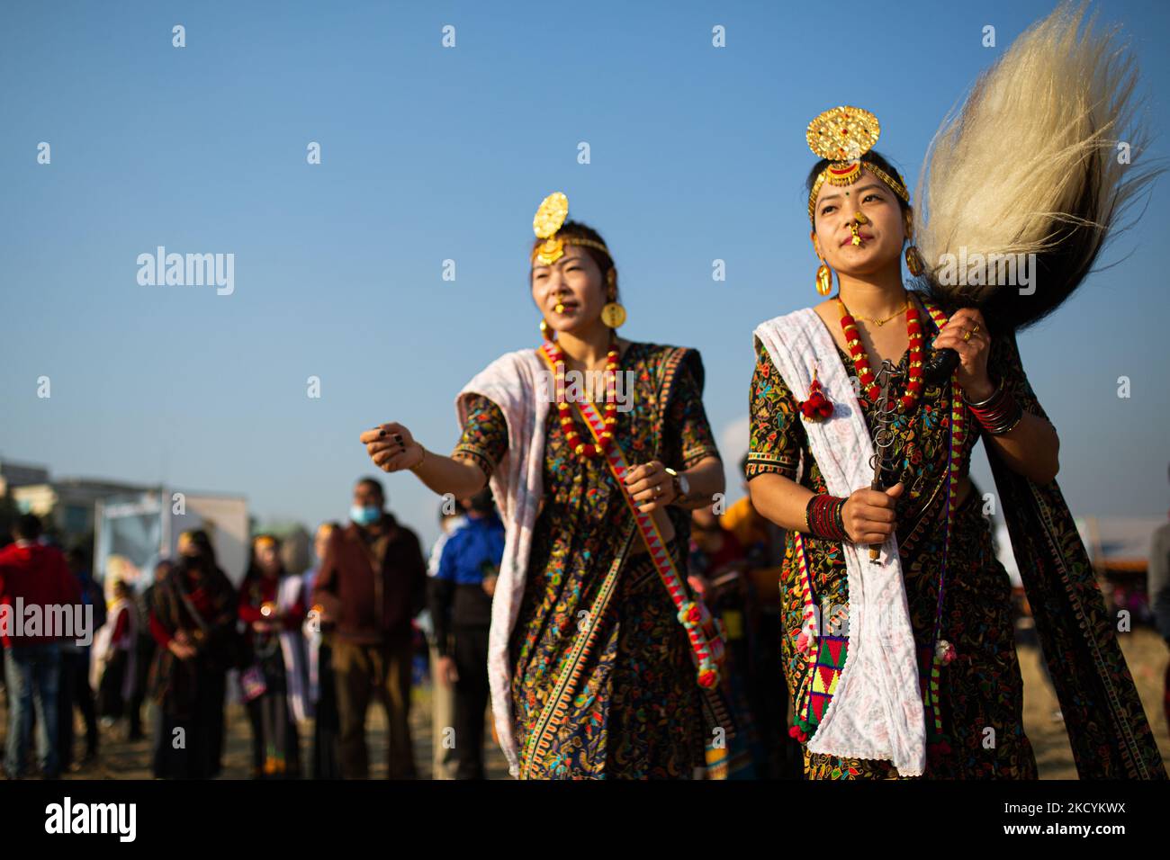 People from the Kirat community wearing traditional attire dance during ...