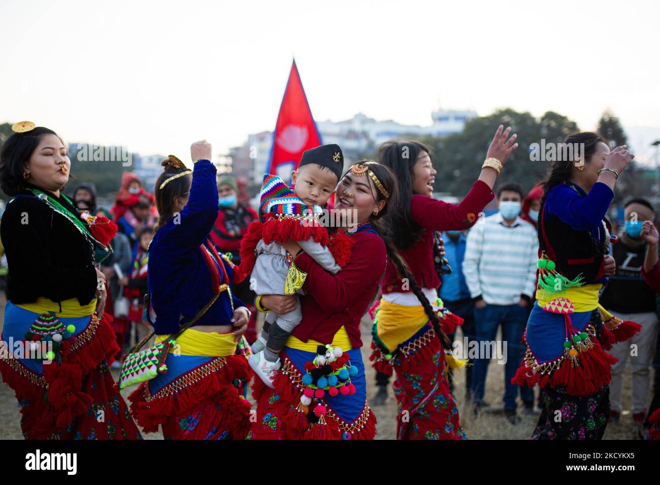 People from the Kirat community wearing traditional attire dance during ...