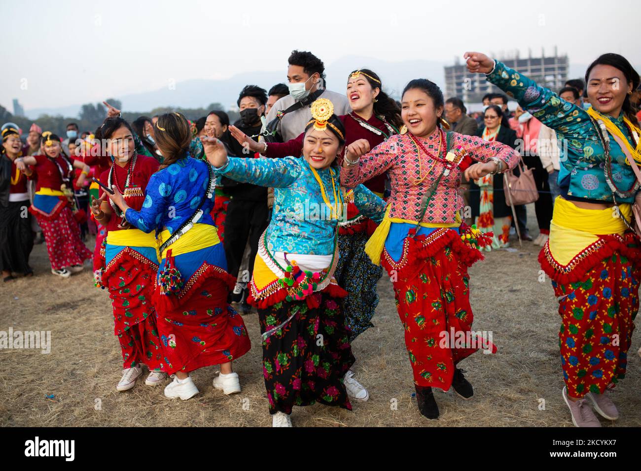People from the Kirat community wearing traditional attire dance during ...
