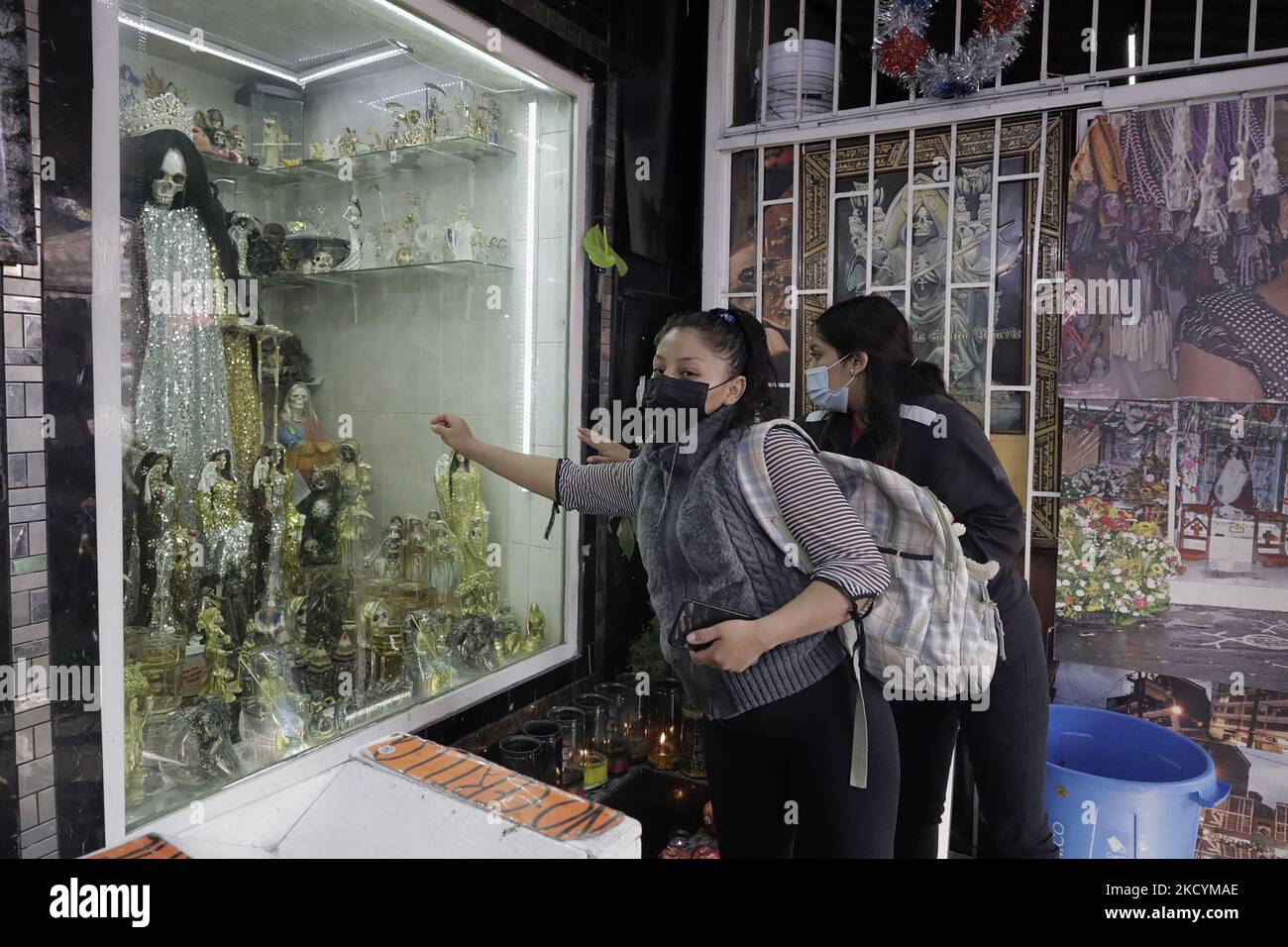 Followers of Santa Muerte visited her temple in Tepito, Mexico City, to ...