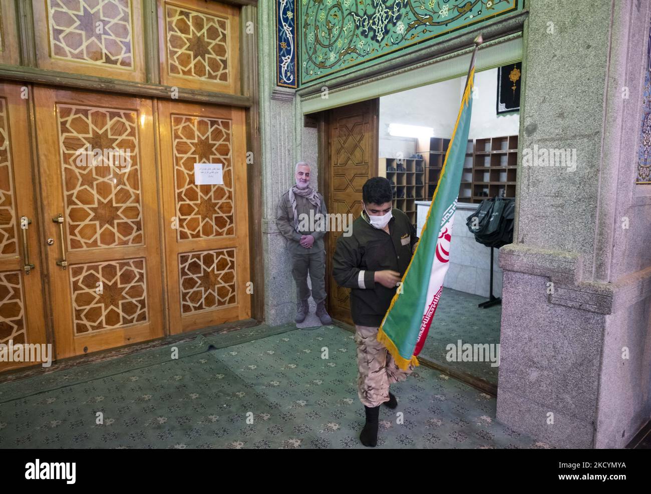 A member of the Islamic Revolutionary Guard Corps (IRGC) carrying an ...