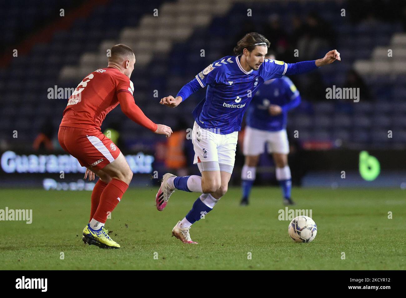 Oldham Athletic's Samuel Hart tussles with Max Power of Wigan Athletic ...