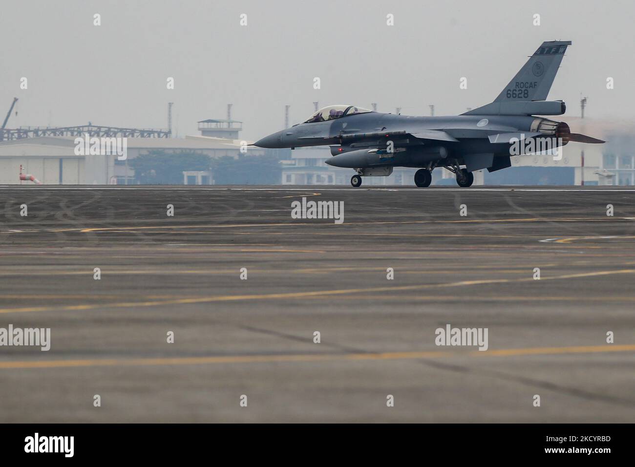 An F-16V jet fighter taxies on the runway for compulsory for an ...