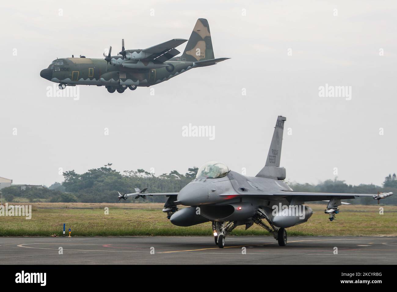 An F-16V jet fighter taxies on the runway for an emergency takeoff ...