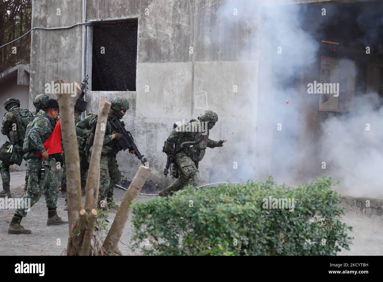 Soldiers ignite a device for door explosion, during an Army ...