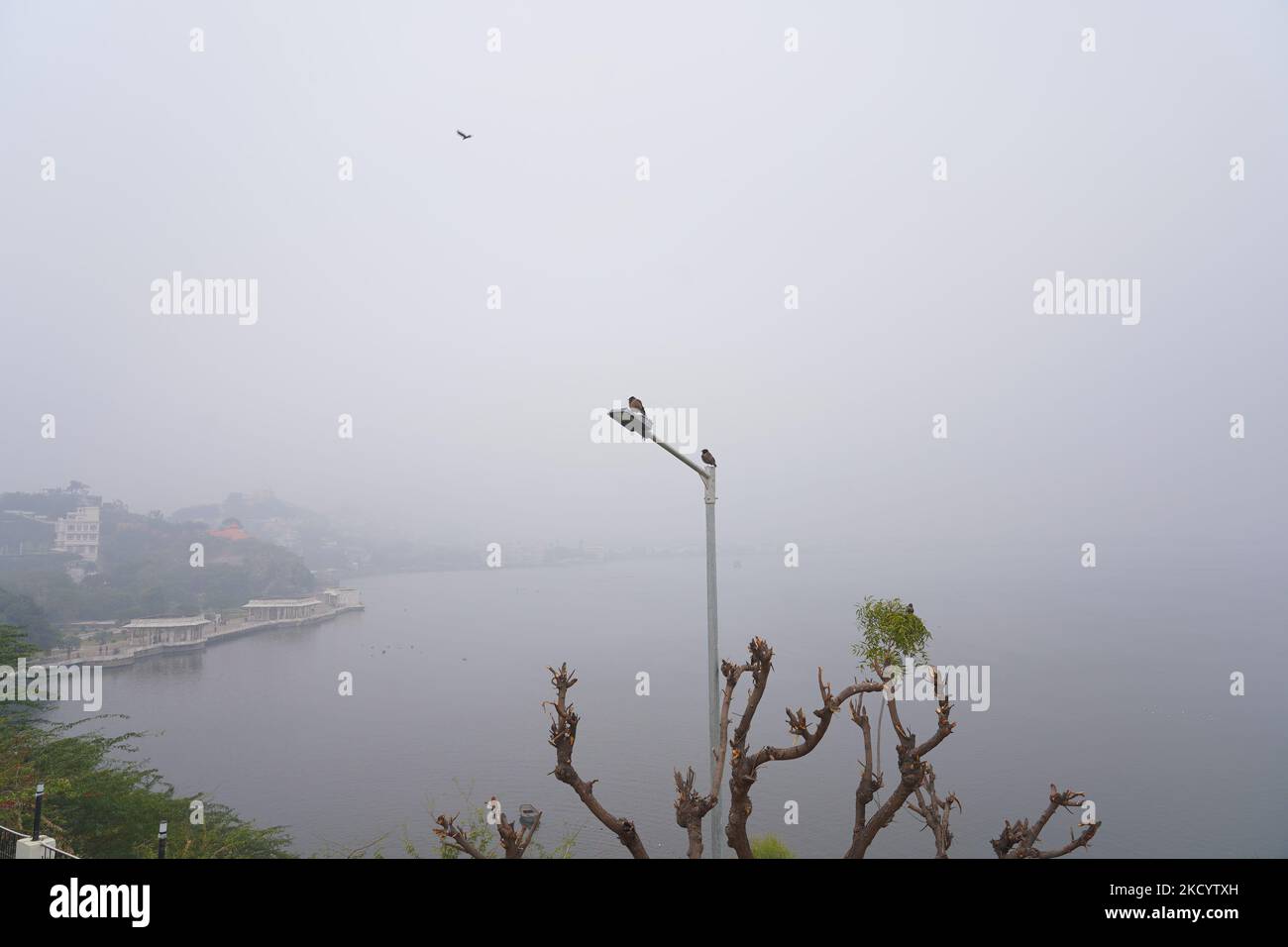 A View of Anasagar lake During Dense foggy morning in Ajmer, Rajasthan ...